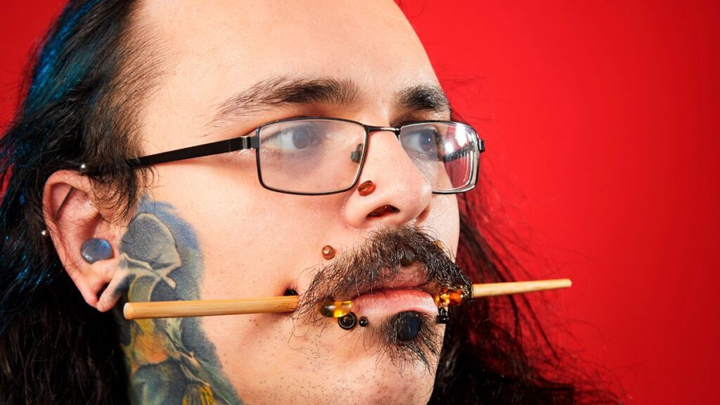 27 YEAR OLD HIOLDS TITLE FOR THE MOST FLESH TUNNELS - Legend FM